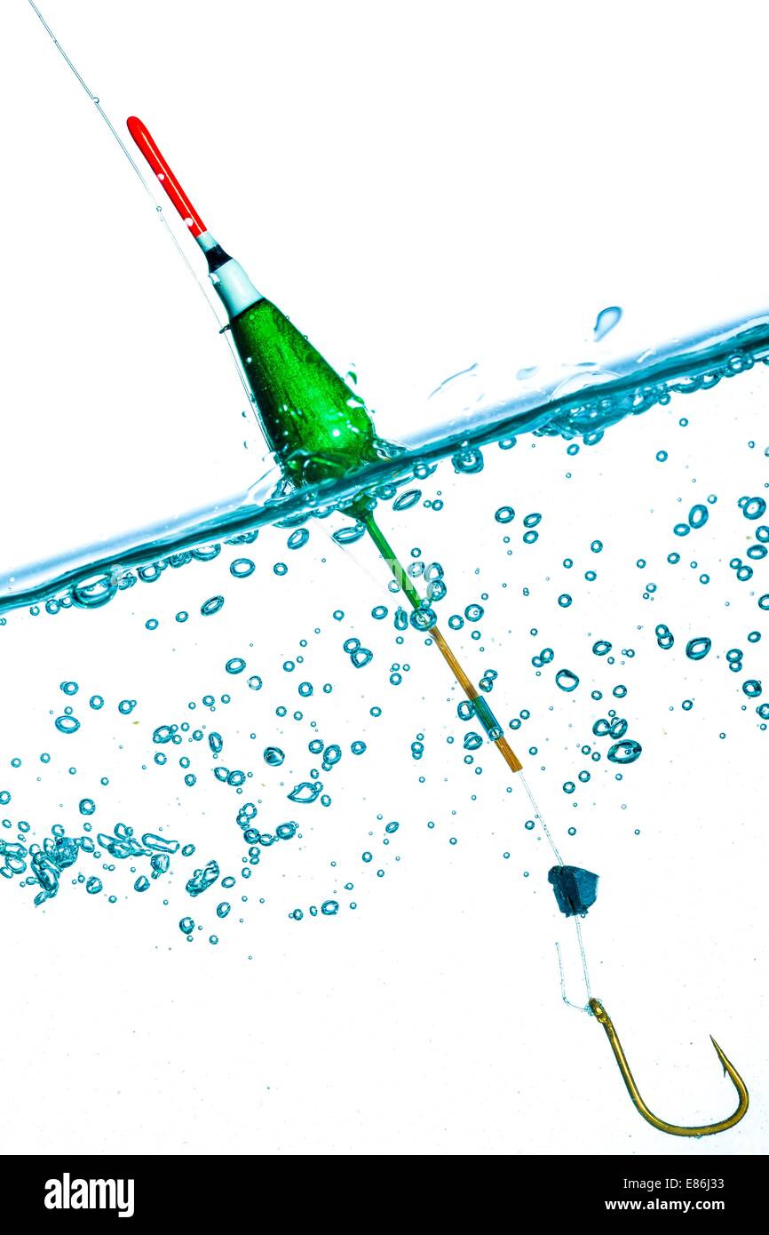 Fishing float against on a white background Stock Photo - Alamy