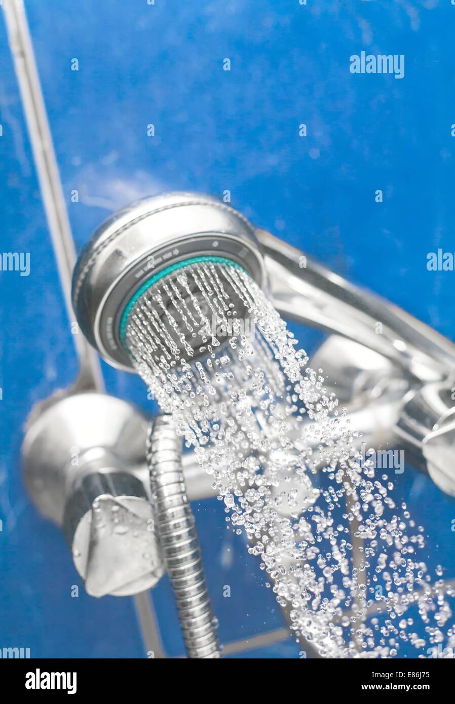a shower head is spraying water Stock Photo - Alamy
