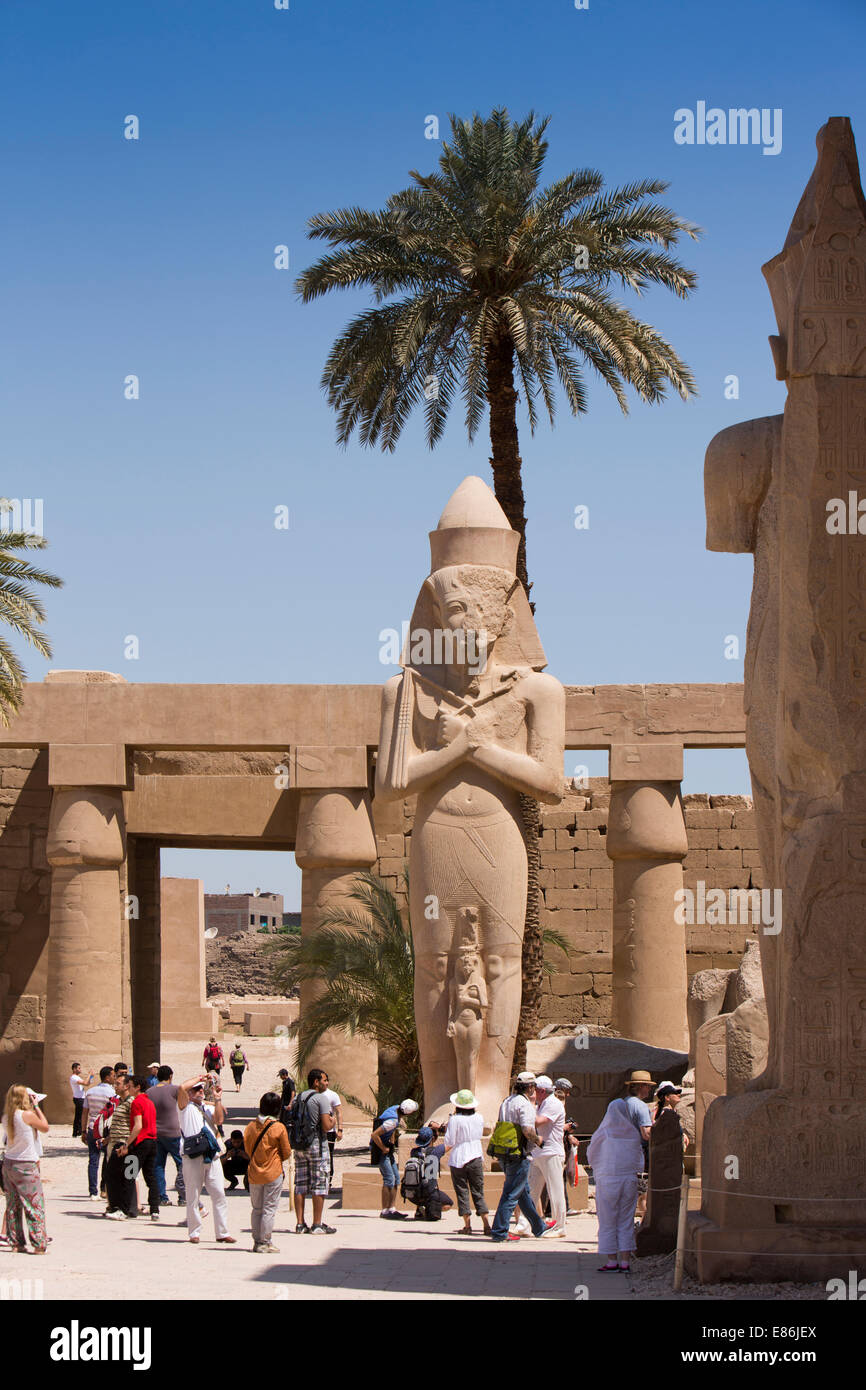 Egypt, Luxor, Karnak Temple, colossus of Rameses II, with Nefertari at ...
