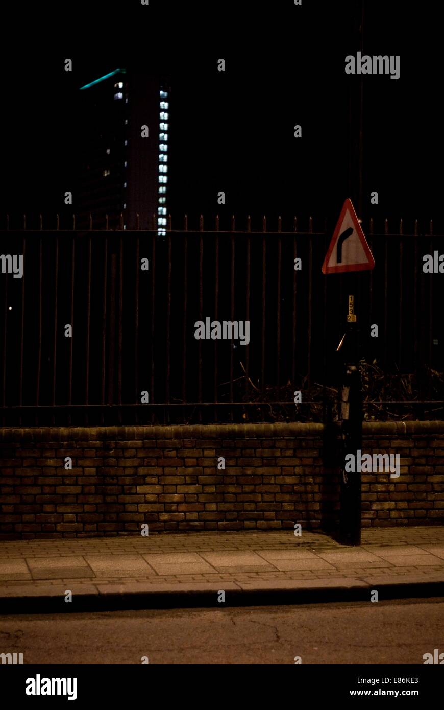 Road sign at night Stock Photo - Alamy