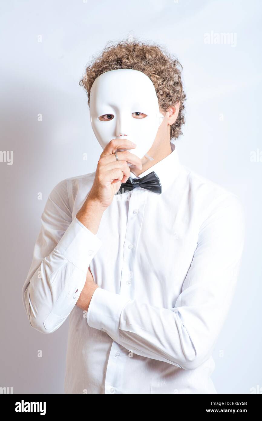 Face mime close-up emotion in thought, a black bow tie, and mask Stock ...
