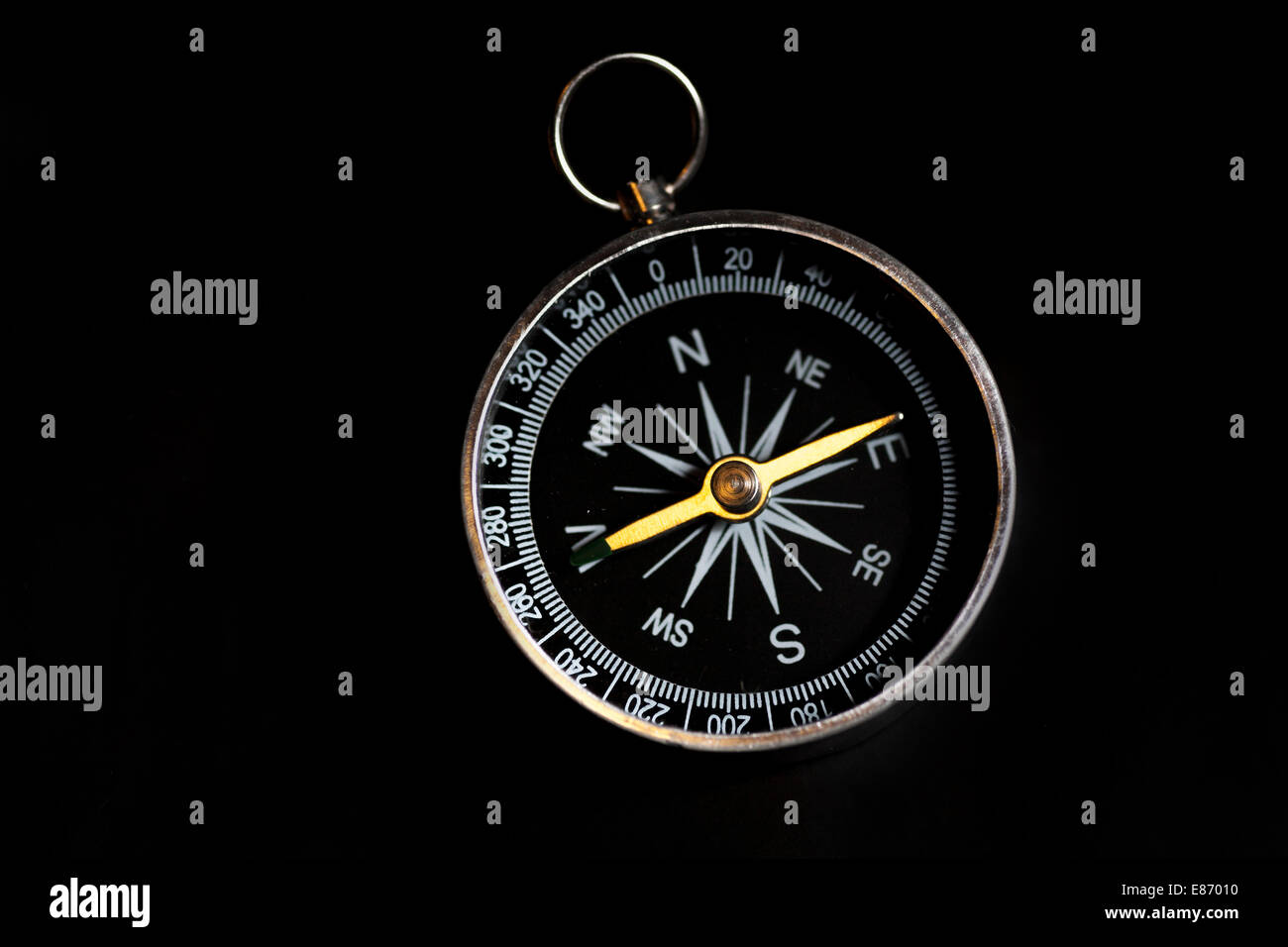compass on black background Stock Photo - Alamy