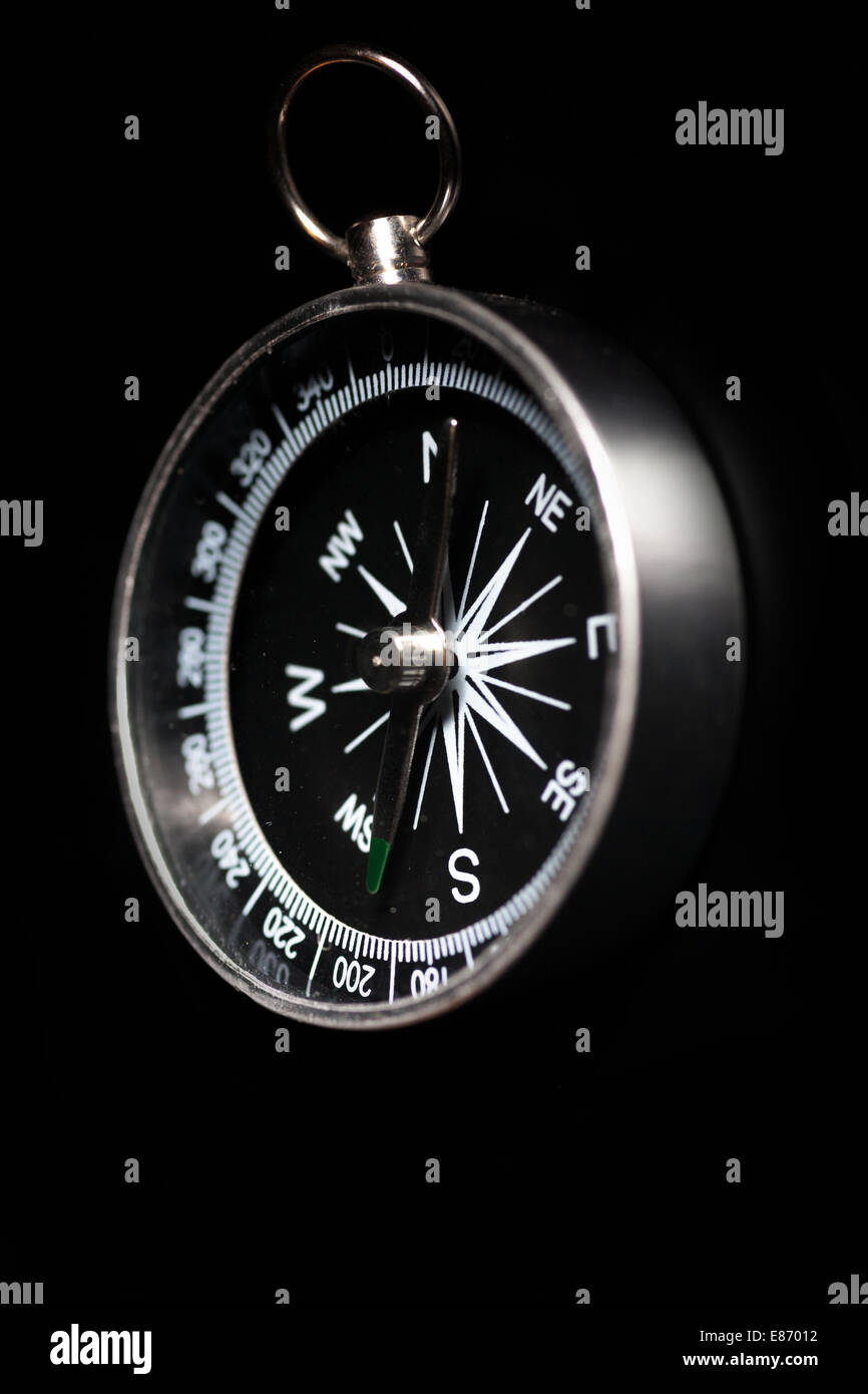 compass on black background Stock Photo - Alamy