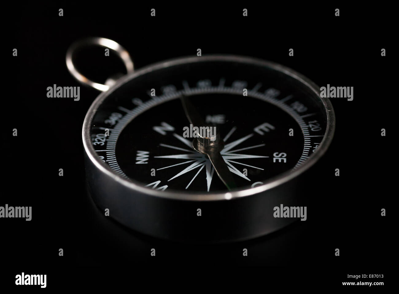 compass on black background Stock Photo - Alamy