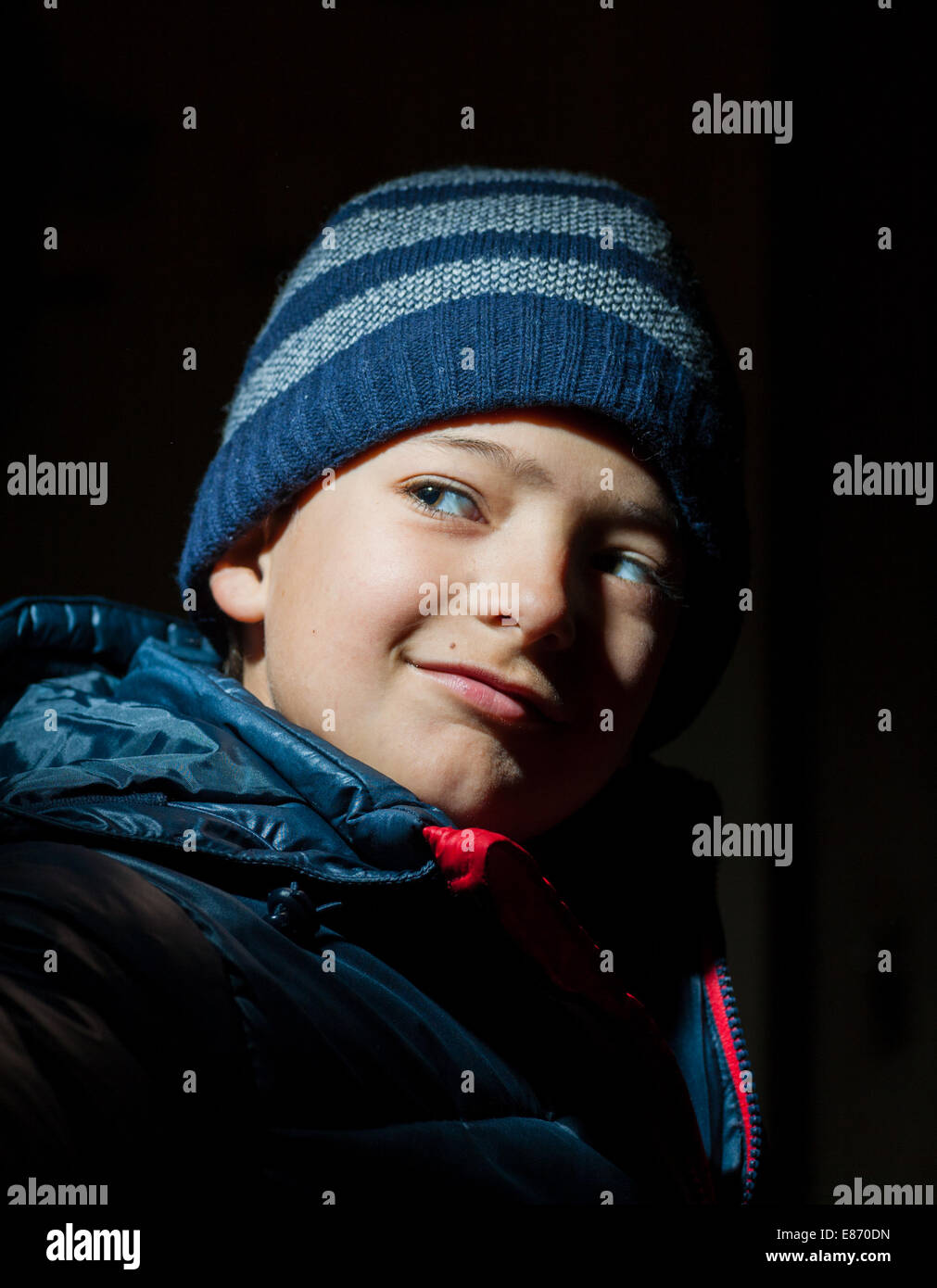 boy half lit looking up Stock Photo - Alamy