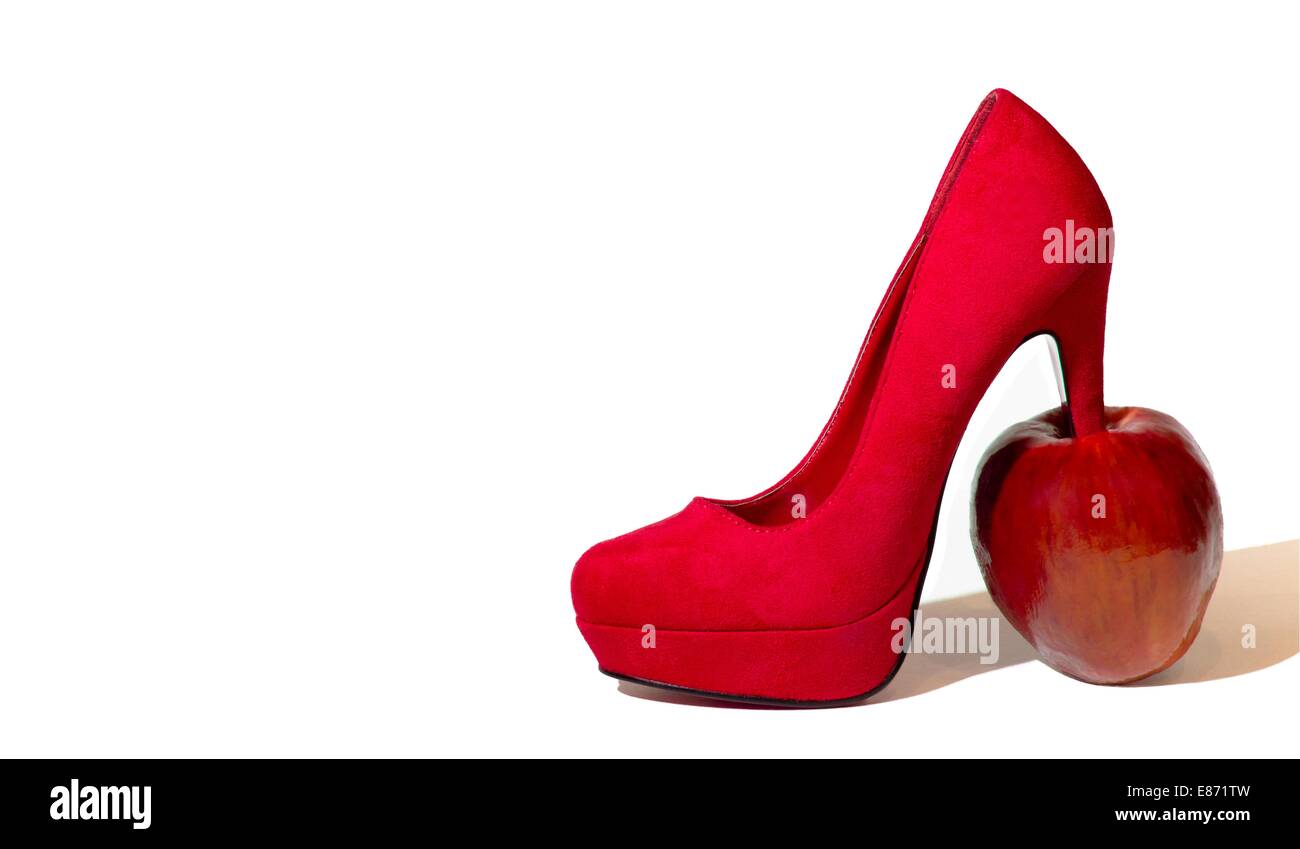 Shoe with apple Stock Photo - Alamy