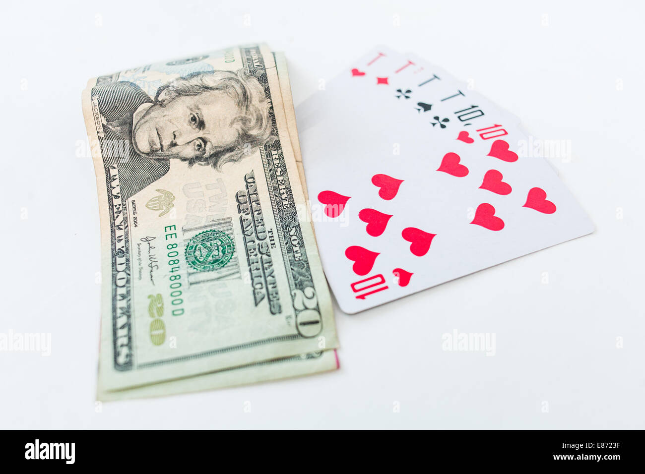 Win in poker. Tens and dollars Stock Photo - Alamy
