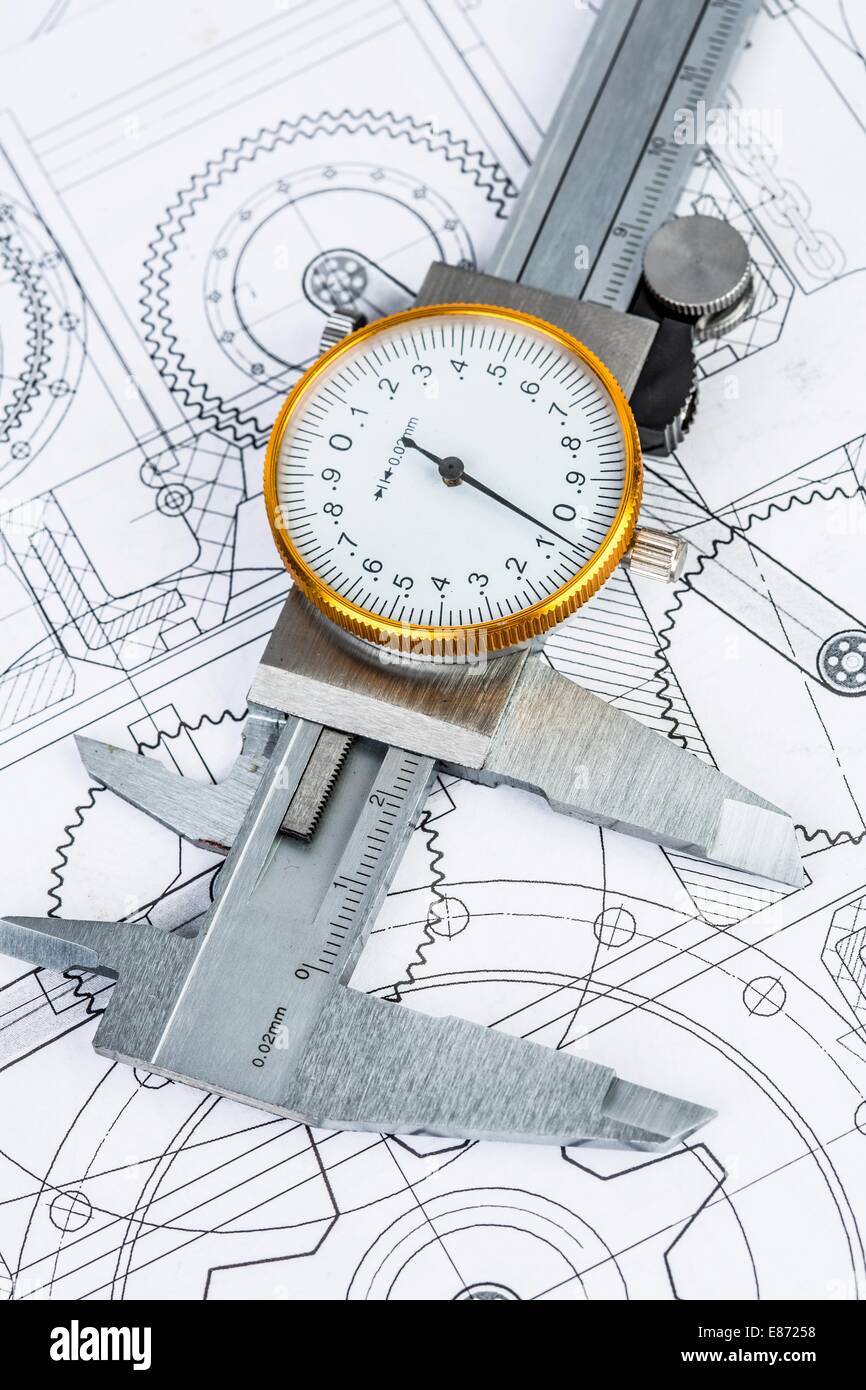 Metal vernier caliper on technical drawing Stock Photo - Alamy