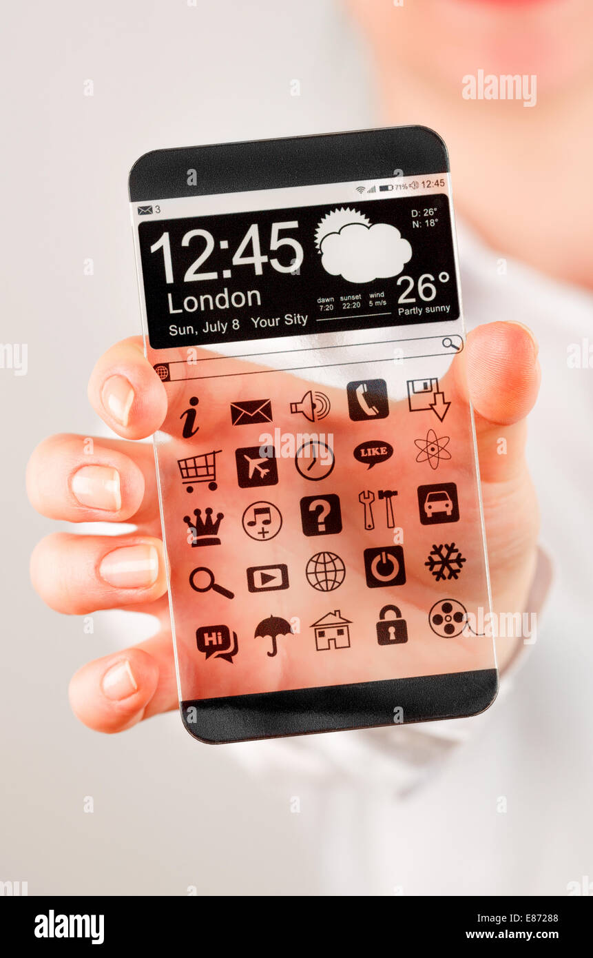 Smartphone (phablet) with a transparent display in human hands. Concept ...