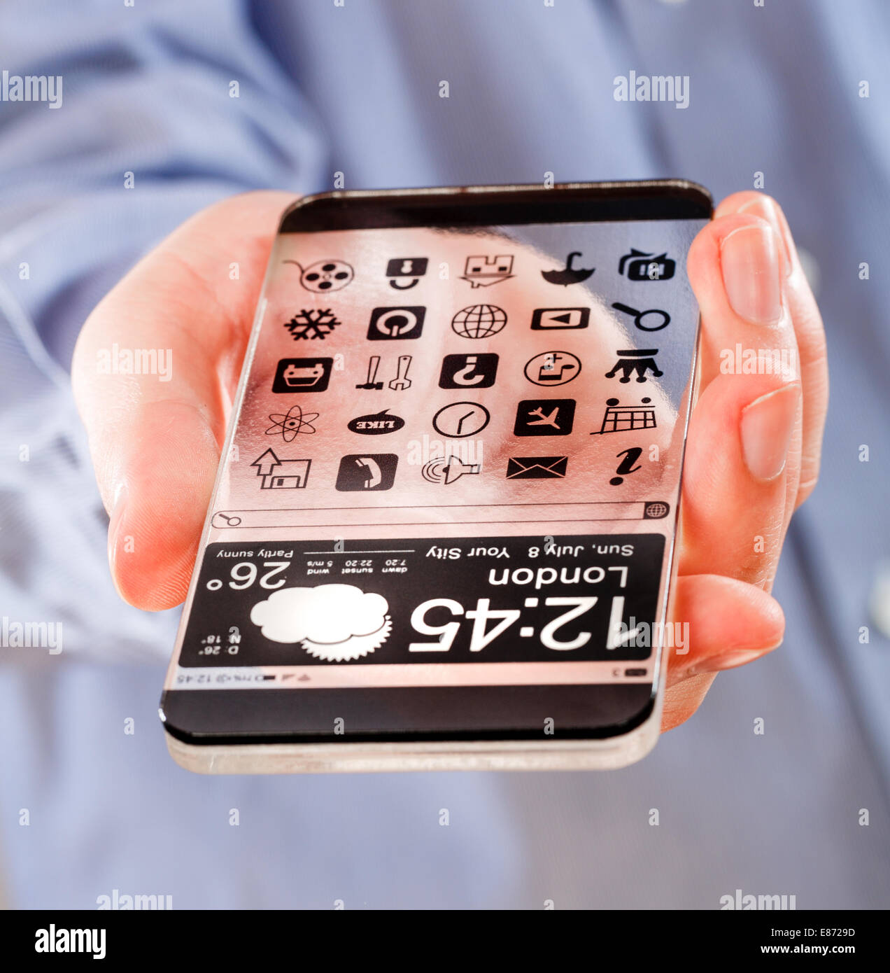 Smartphone (phablet) with a transparent display in human hands. Concept ...