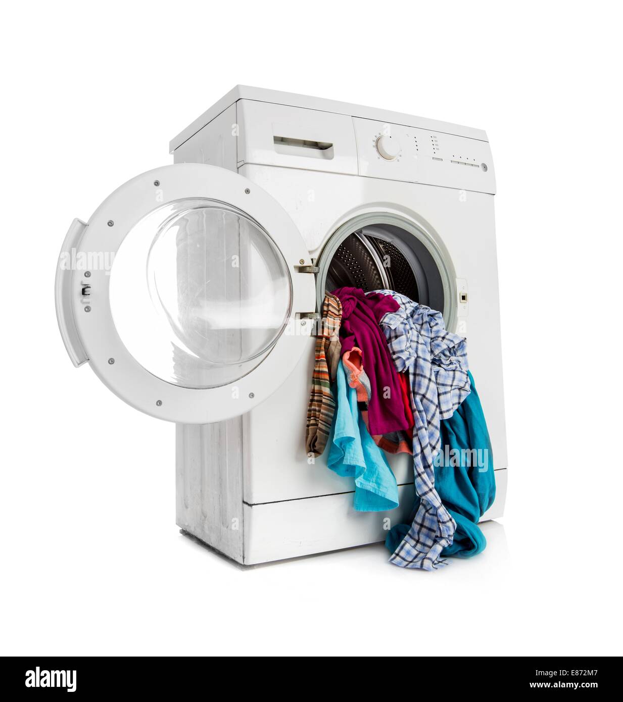 Washing machine with clean linen on a white background Stock Photo - Alamy