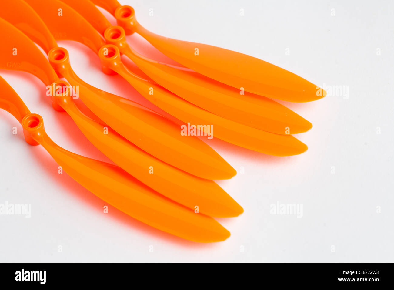 Propeller set of orange color on white Stock Photo - Alamy