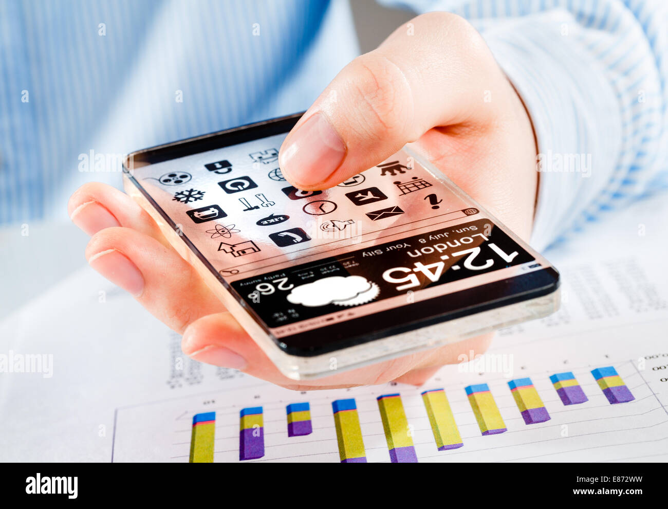 Smartphone (phablet) with a transparent display in human hands. Concept ...