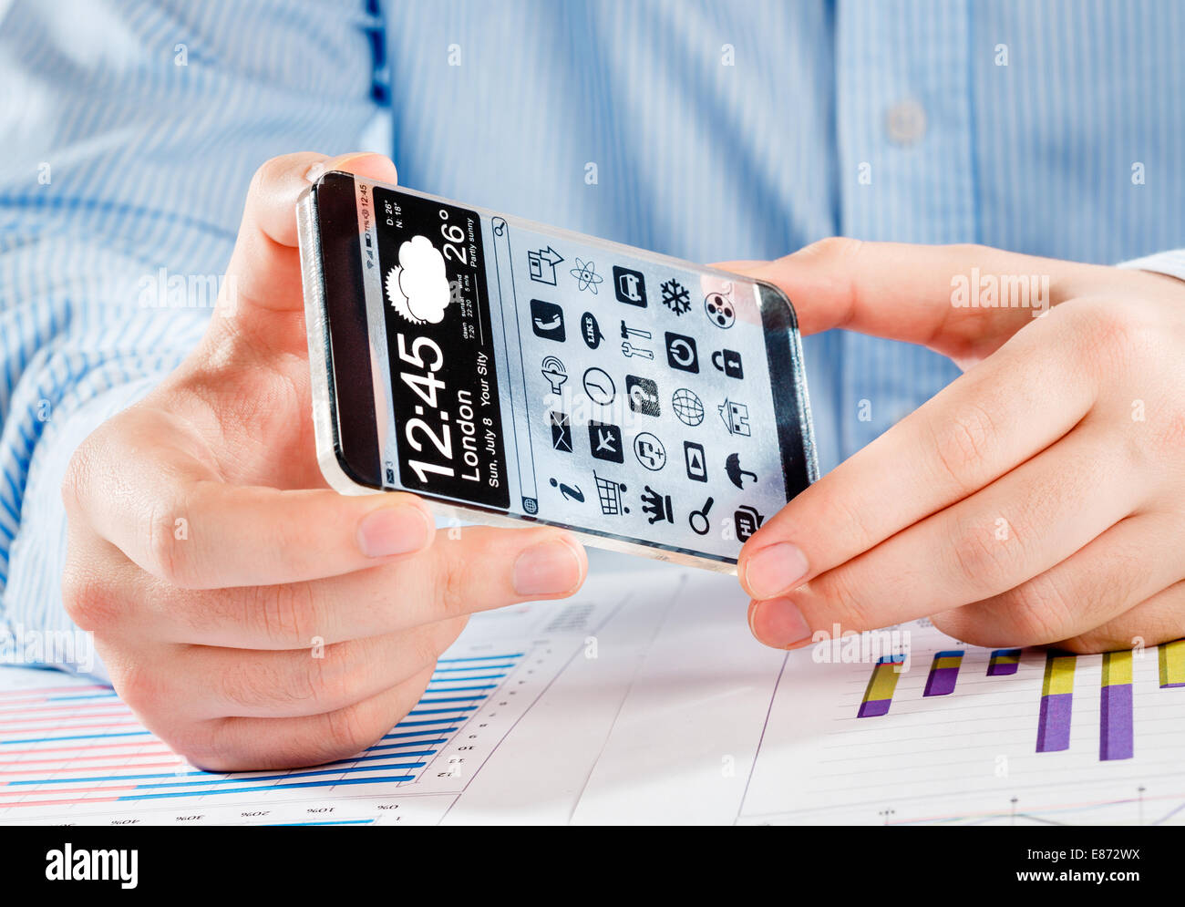 Smartphone (phablet) with a transparent display in human hands. Concept ...