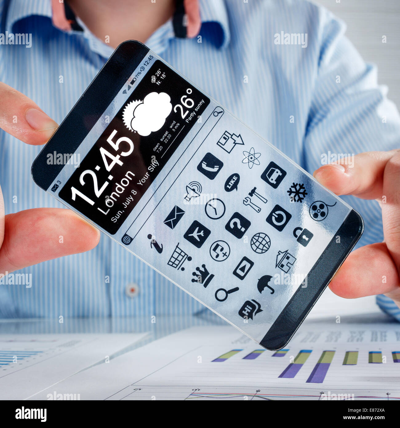 Smartphone (phablet) with a transparent display in human hands. Concept ...