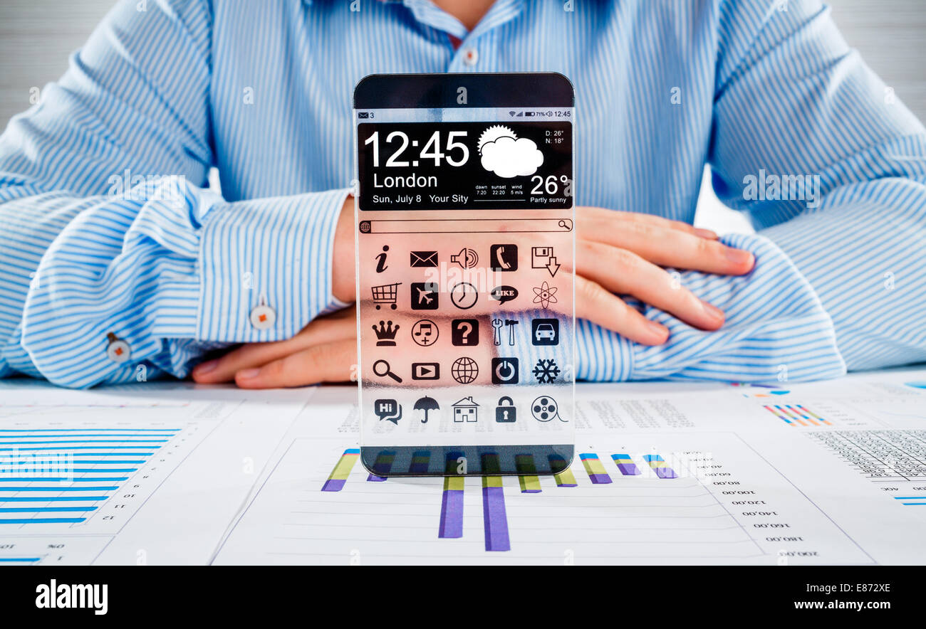 Smartphone (phablet) with a transparent display in human hands. Concept ...