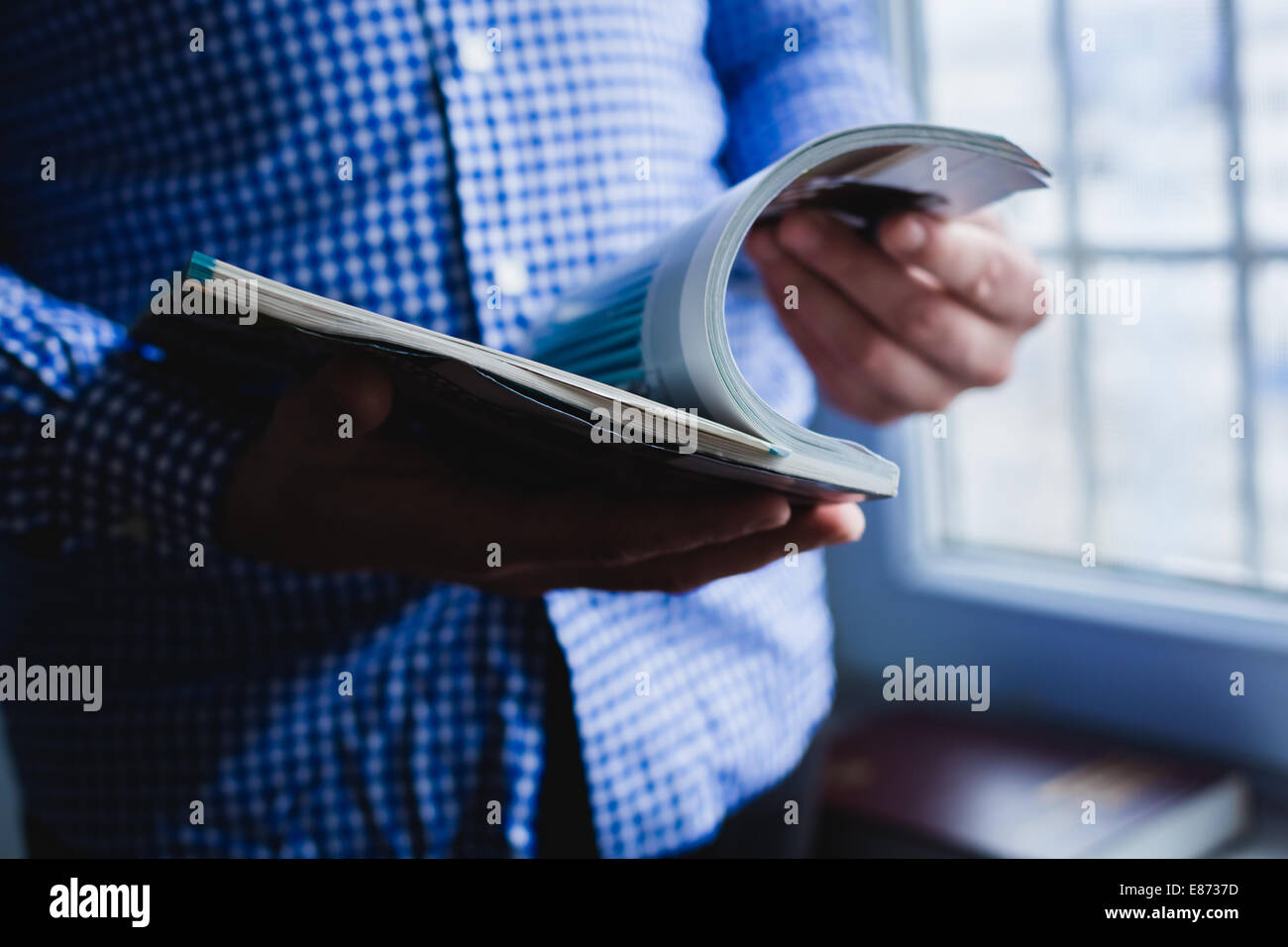 Blank white page of a folded magazine hi-res stock photography and ...