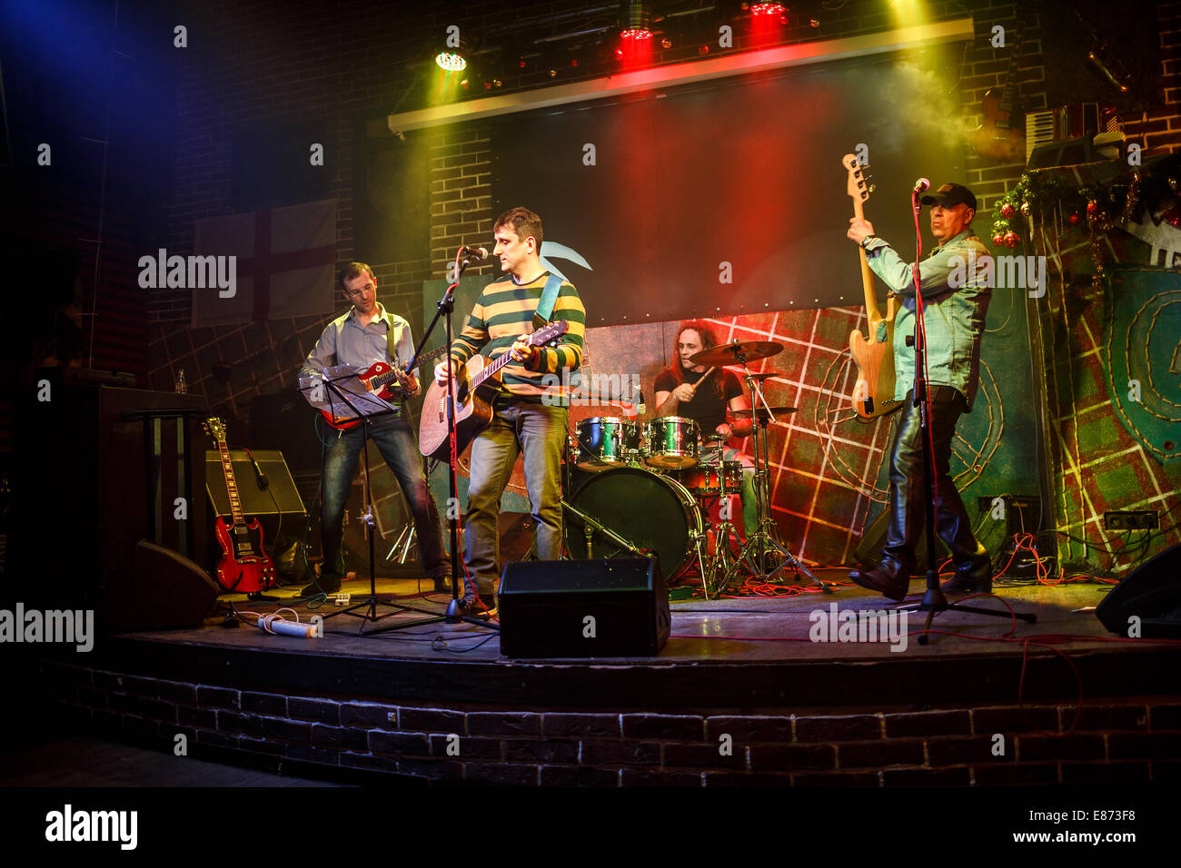 Band performs on stage, rock music concert Stock Photo - Alamy