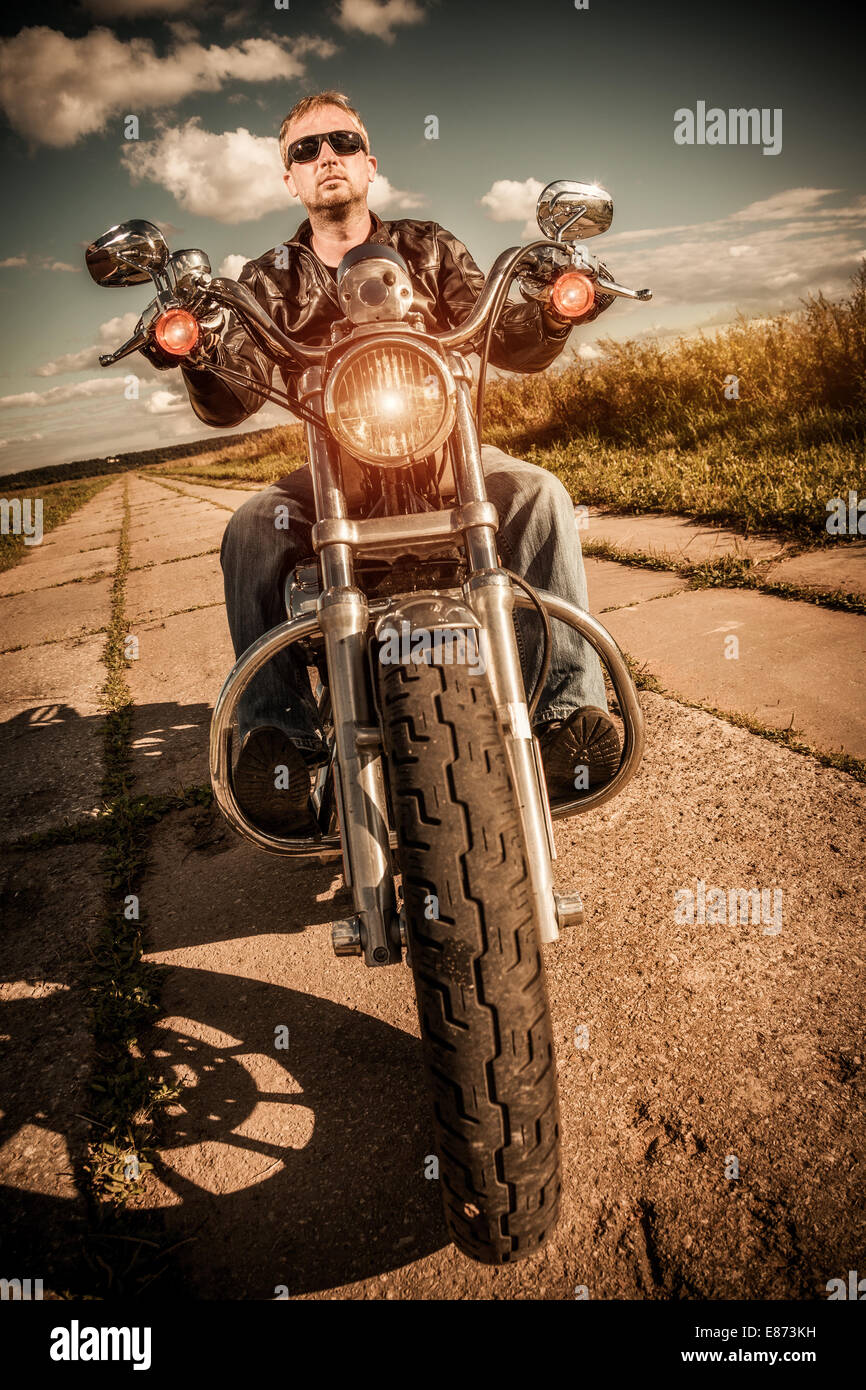 Man on motorcycle wearing leather jacket hi-res stock photography and ...