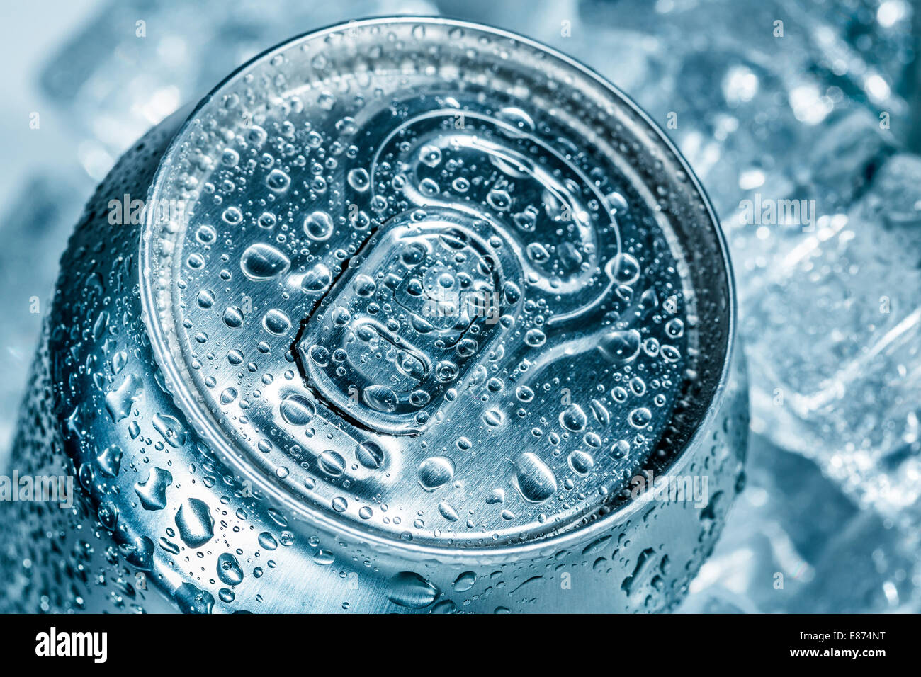 Can of soft drink on ice Stock Photo - Alamy