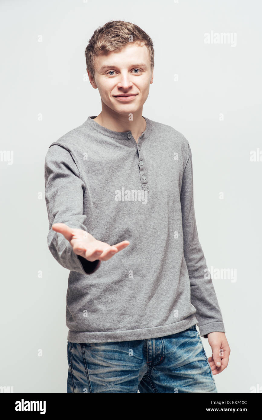 Man stretches out his hand Stock Photo - Alamy