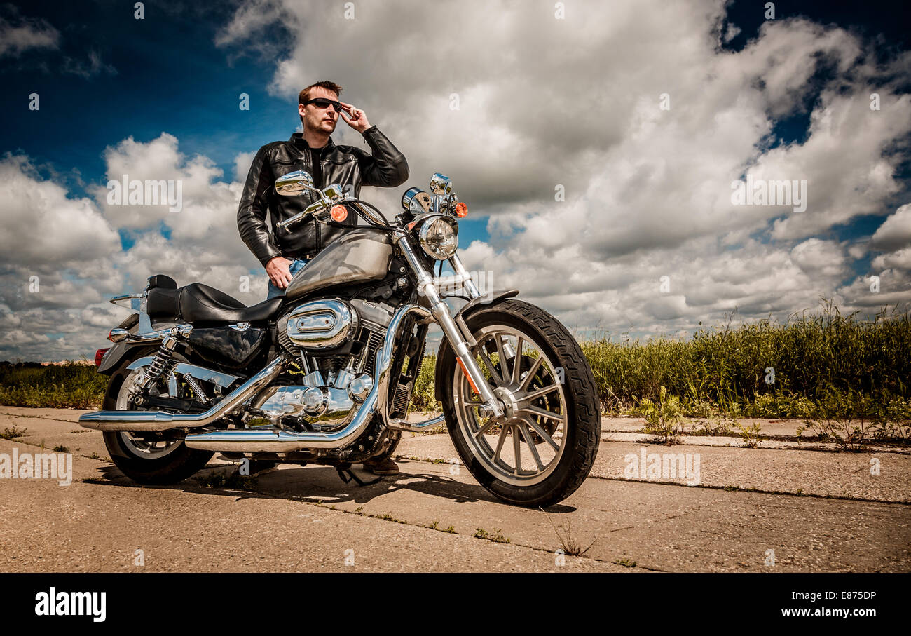 Men in leather on bike hi-res stock photography and images - Alamy