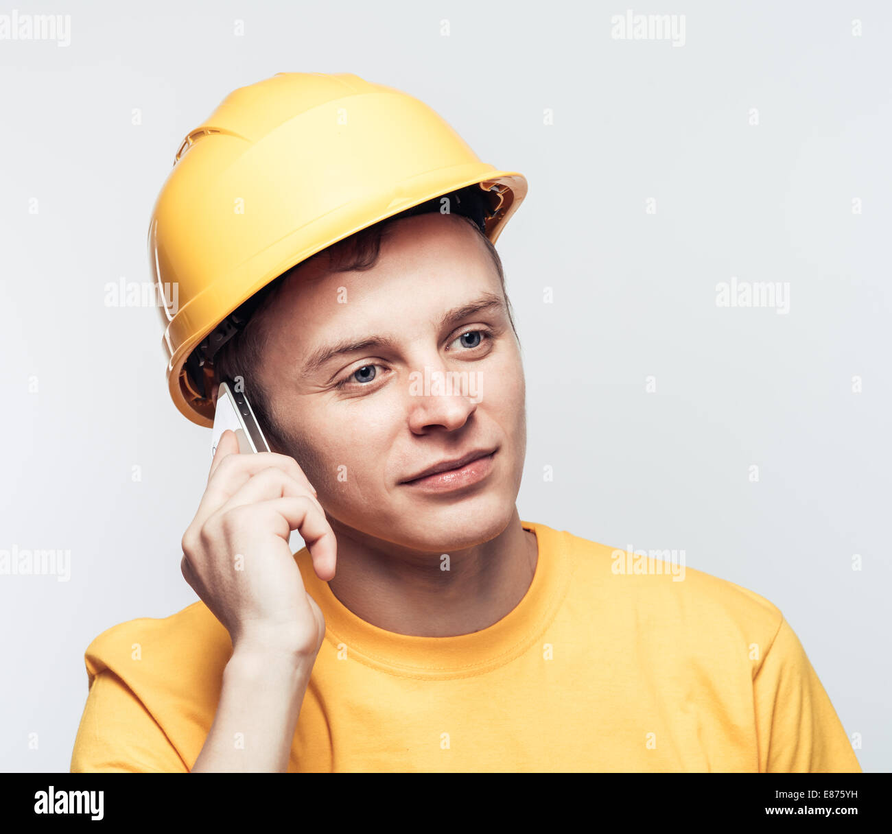 Male worker talking hi-res stock photography and images - Alamy