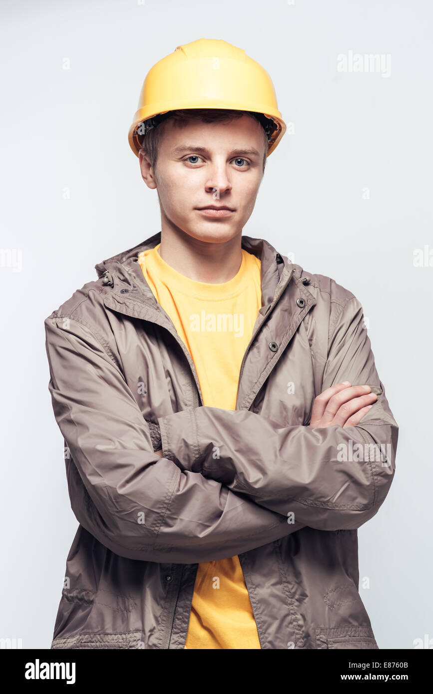 Portrait builder in yellow helmet hi-res stock photography and images ...