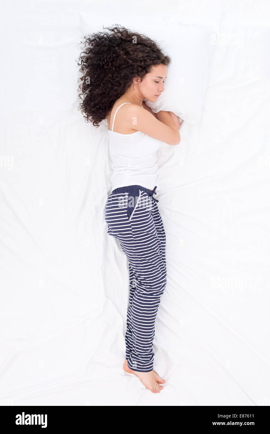 Female sleeping Yearner pose Stock Photo - Alamy