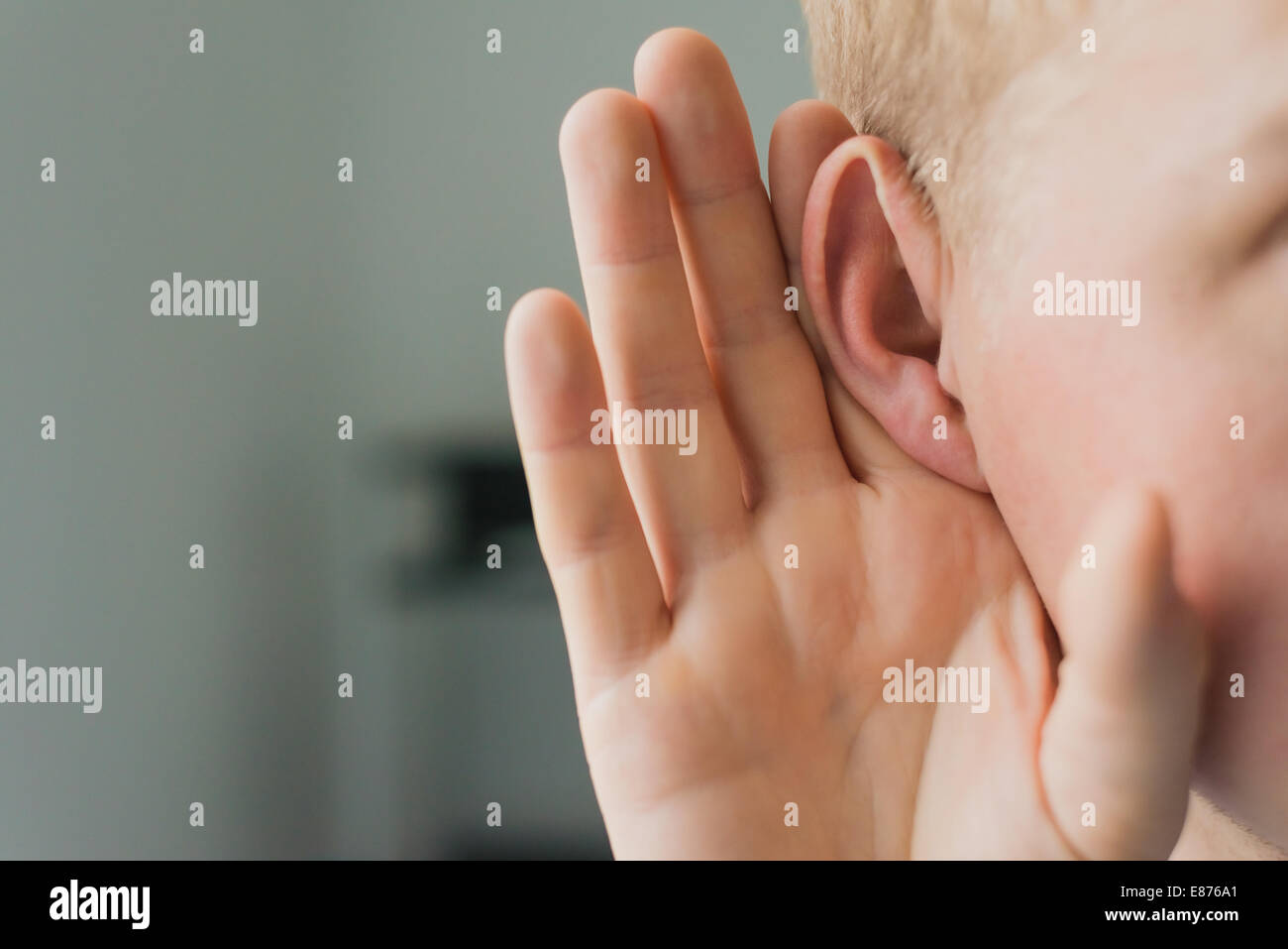 Hand near ear hi-res stock photography and images - Alamy