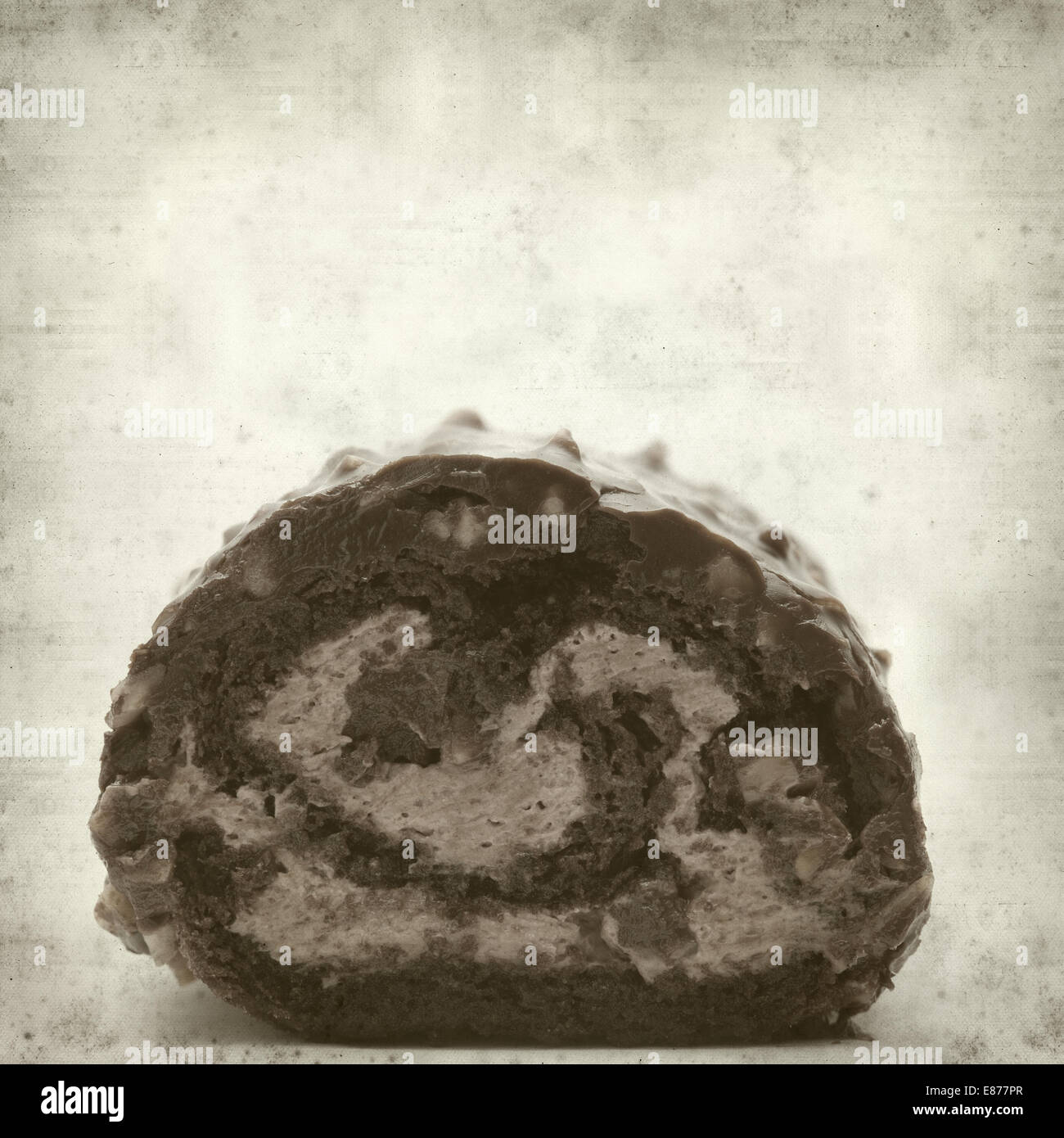 textured old paper background with chocolate roll cake Stock Photo - Alamy