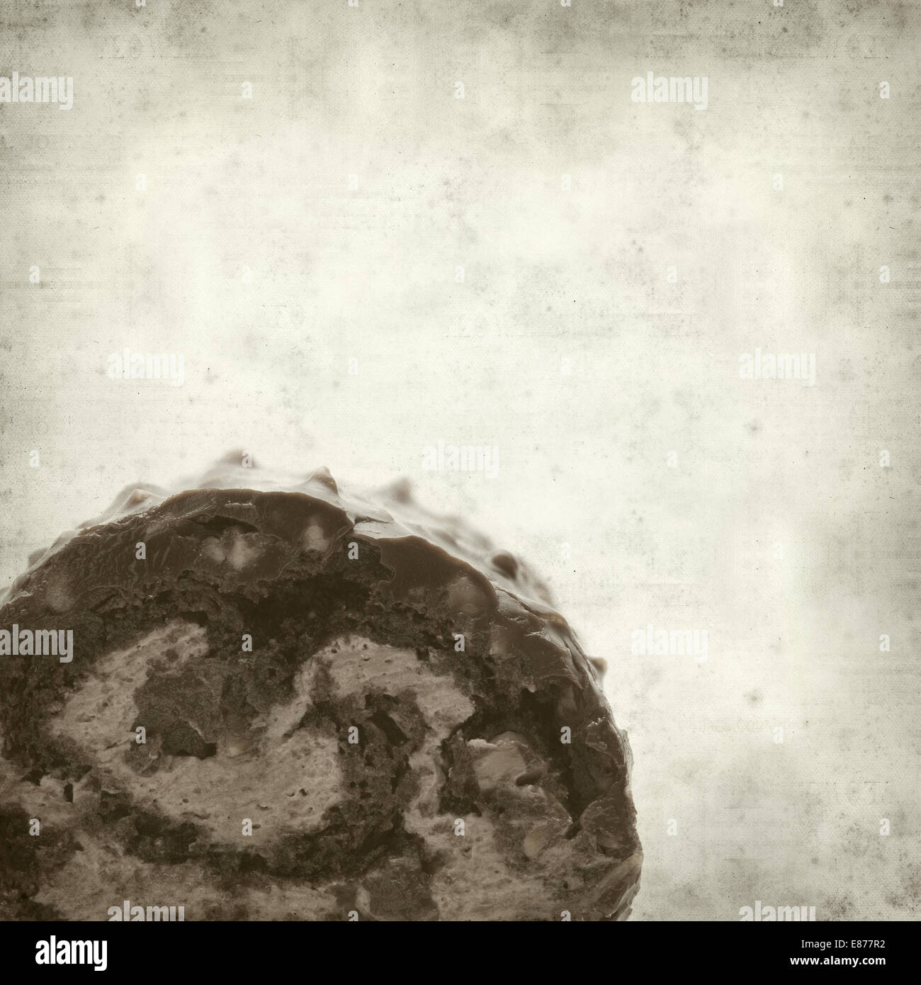 textured old paper background with chocolate roll cake Stock Photo - Alamy