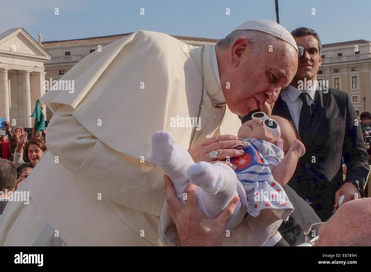 Vatican City. 1st October, 2014. Pope Francis kiss a baby during the ...
