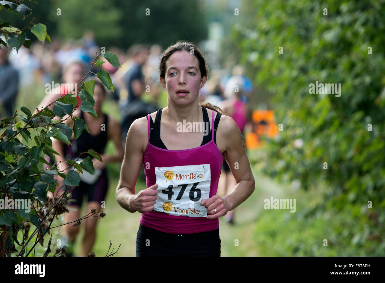 Female triathlete running hi-res stock photography and images - Alamy