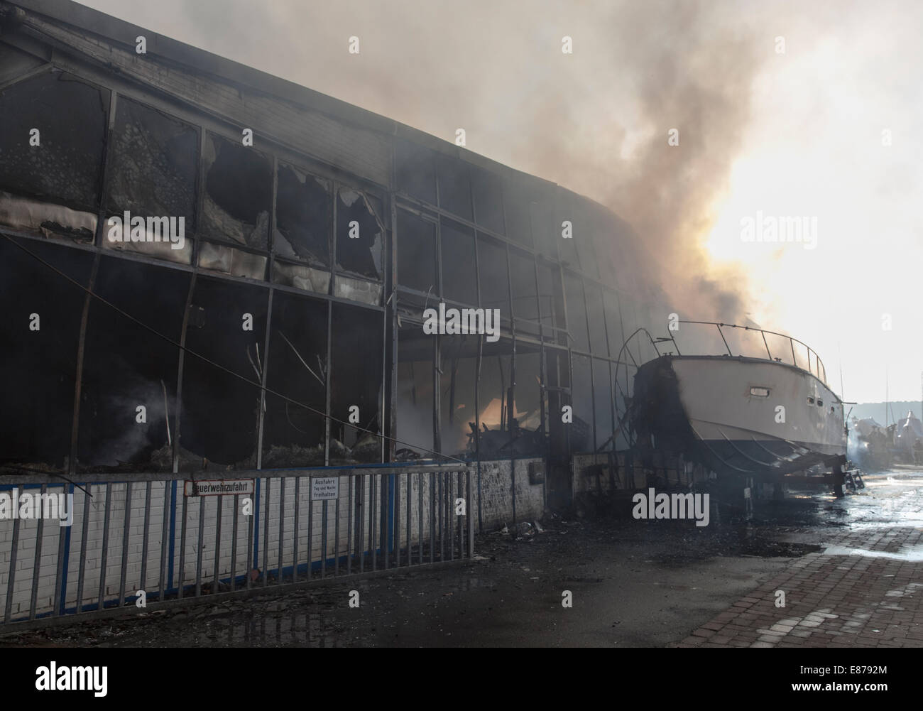 From a warehouse rising smoke on hi-res stock photography and images ...