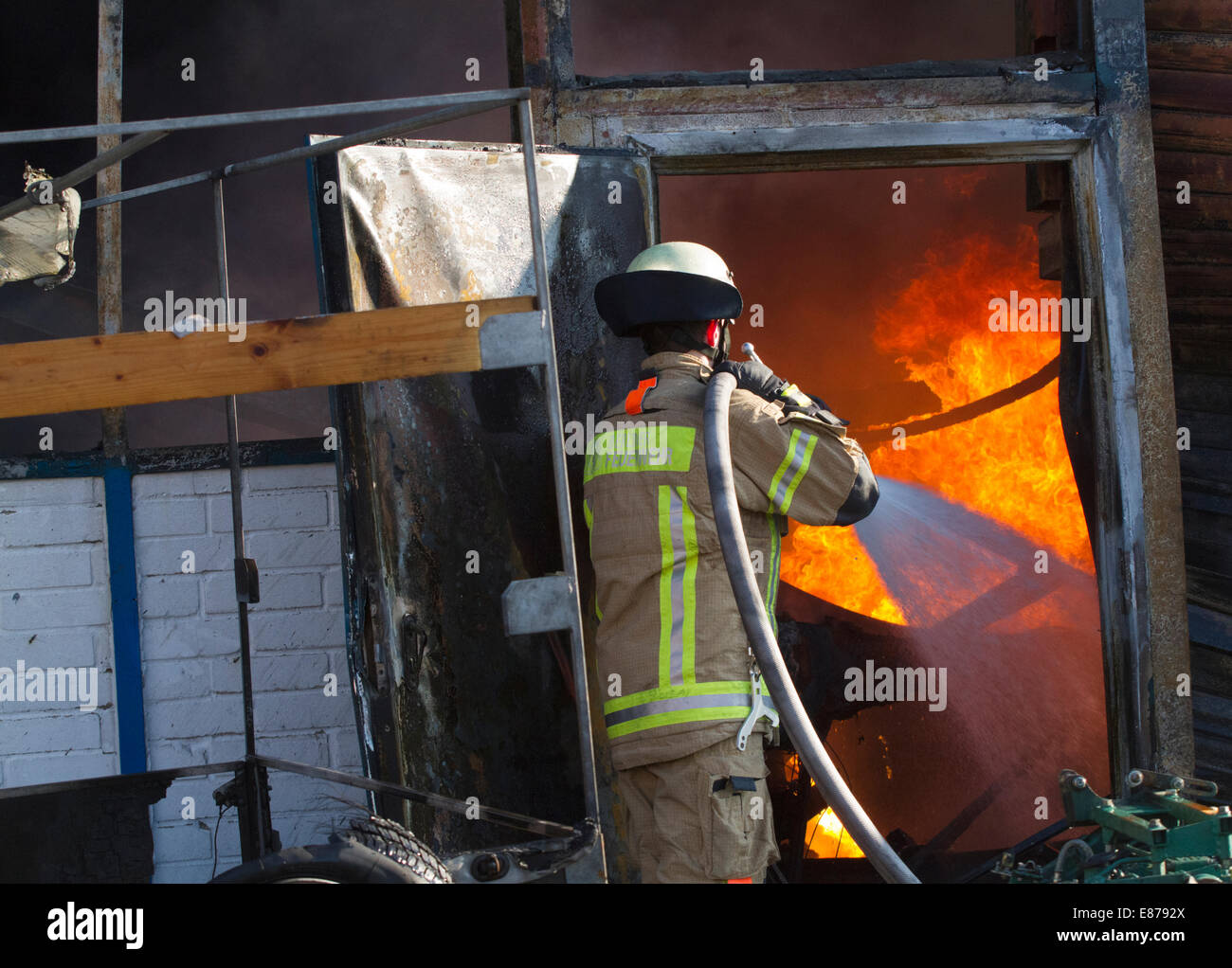 Berlin, Germany, firefighter at work Loesch Stock Photo - Alamy