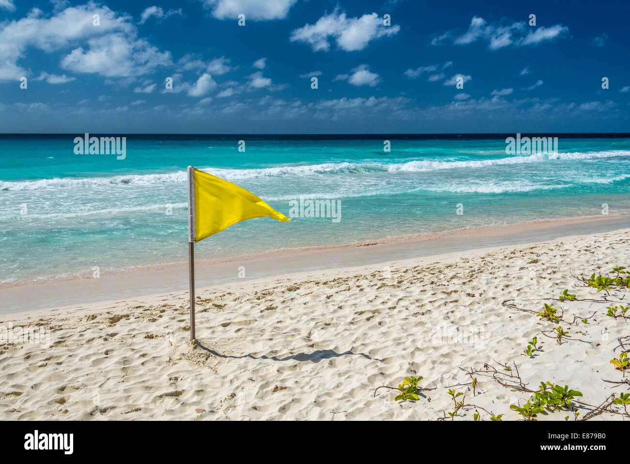 Yellow lifeguards caution flag on Accra Beach, Barbados, West Indies ...