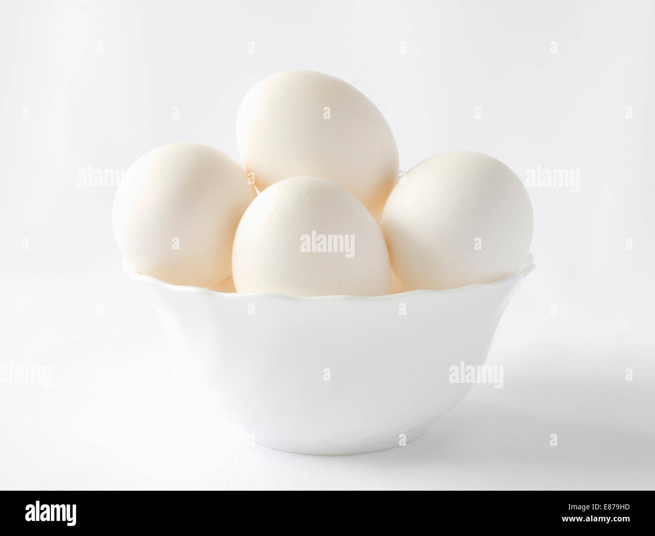 Eggs on white background Stock Photo - Alamy