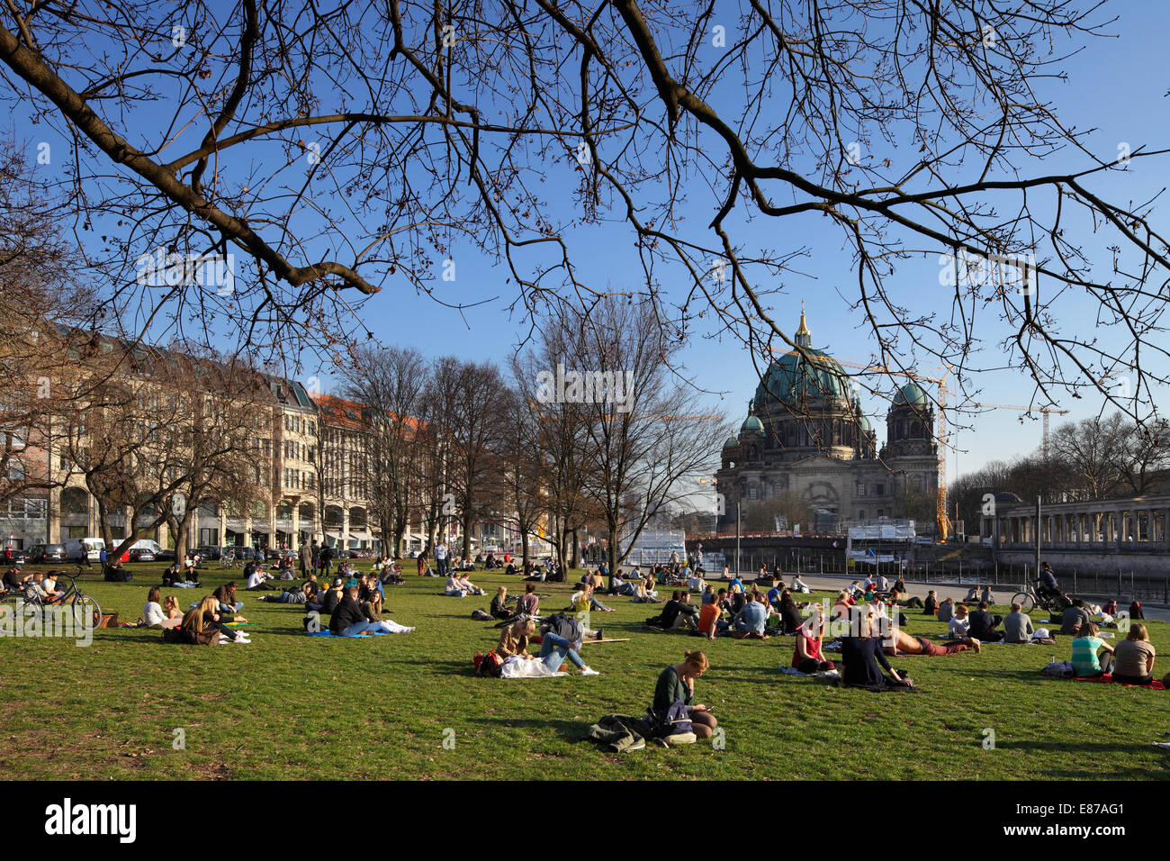 Berlin, Germany, young people sitting on the grass in spring Stock ...