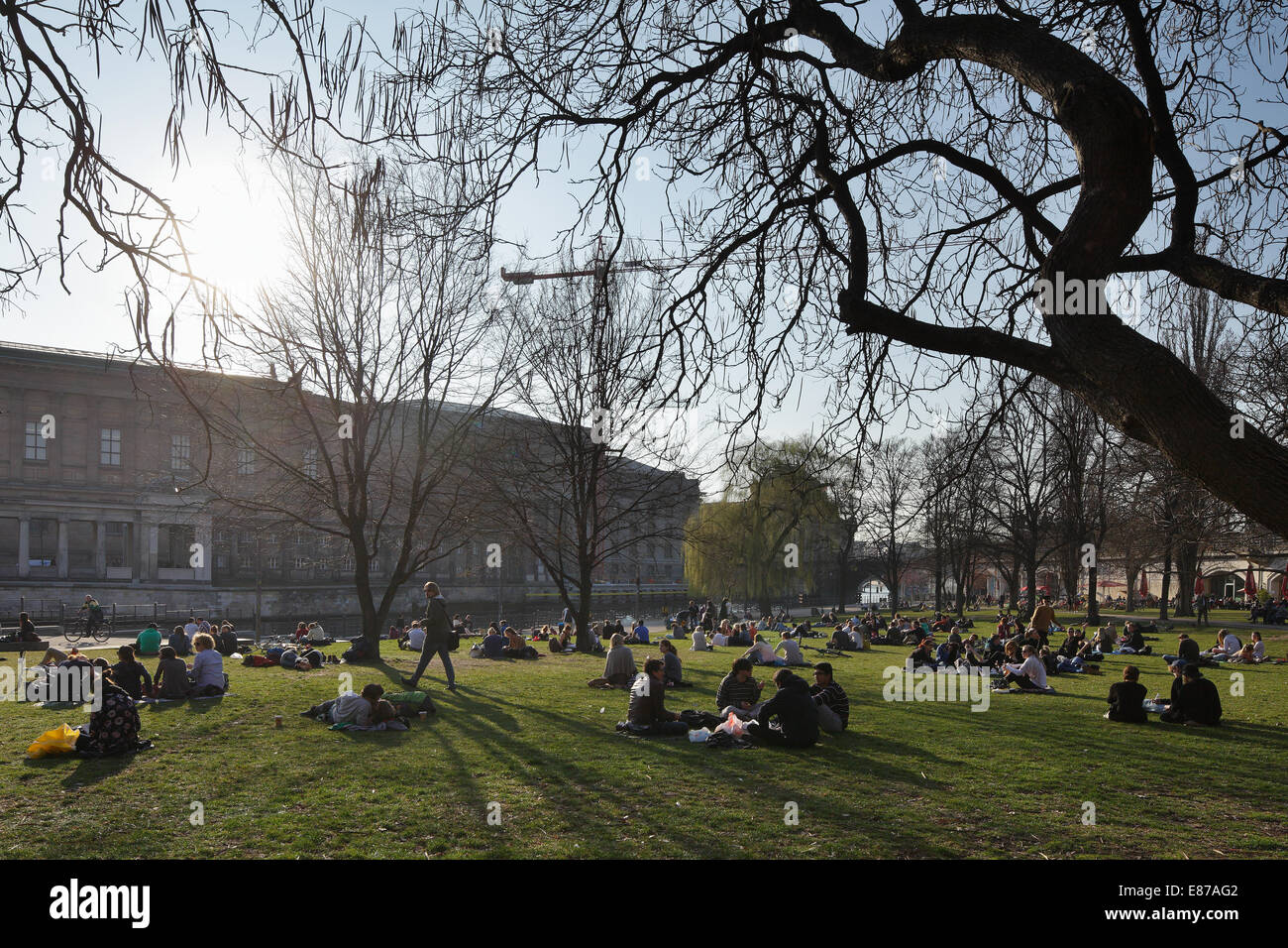 Berlin, Germany, young people sitting on the grass in spring Stock ...