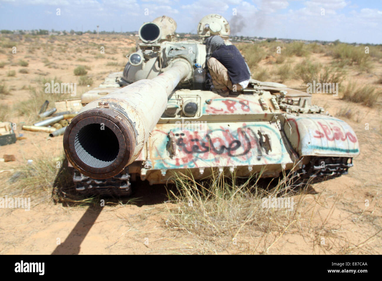 Tripoli, Libya. 1st Oct, 2014. A Libya Dawn fighter sit on a tank in ...