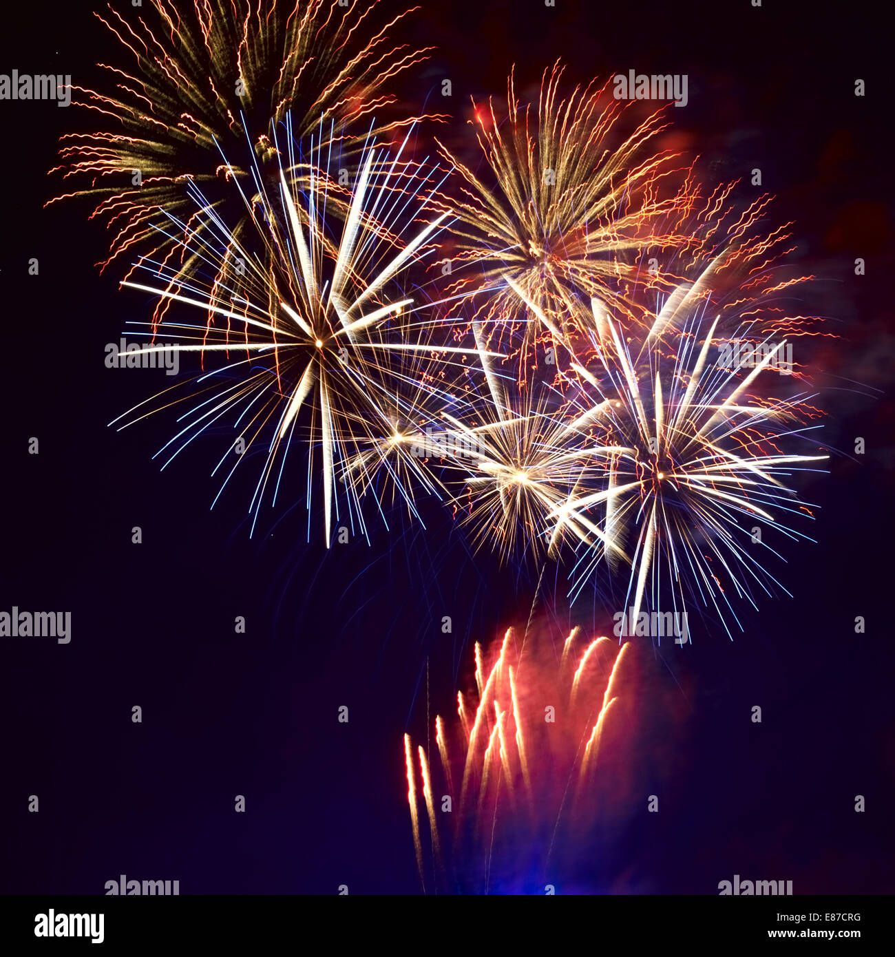Red colorful fireworks on the black sky background Stock Photo - Alamy