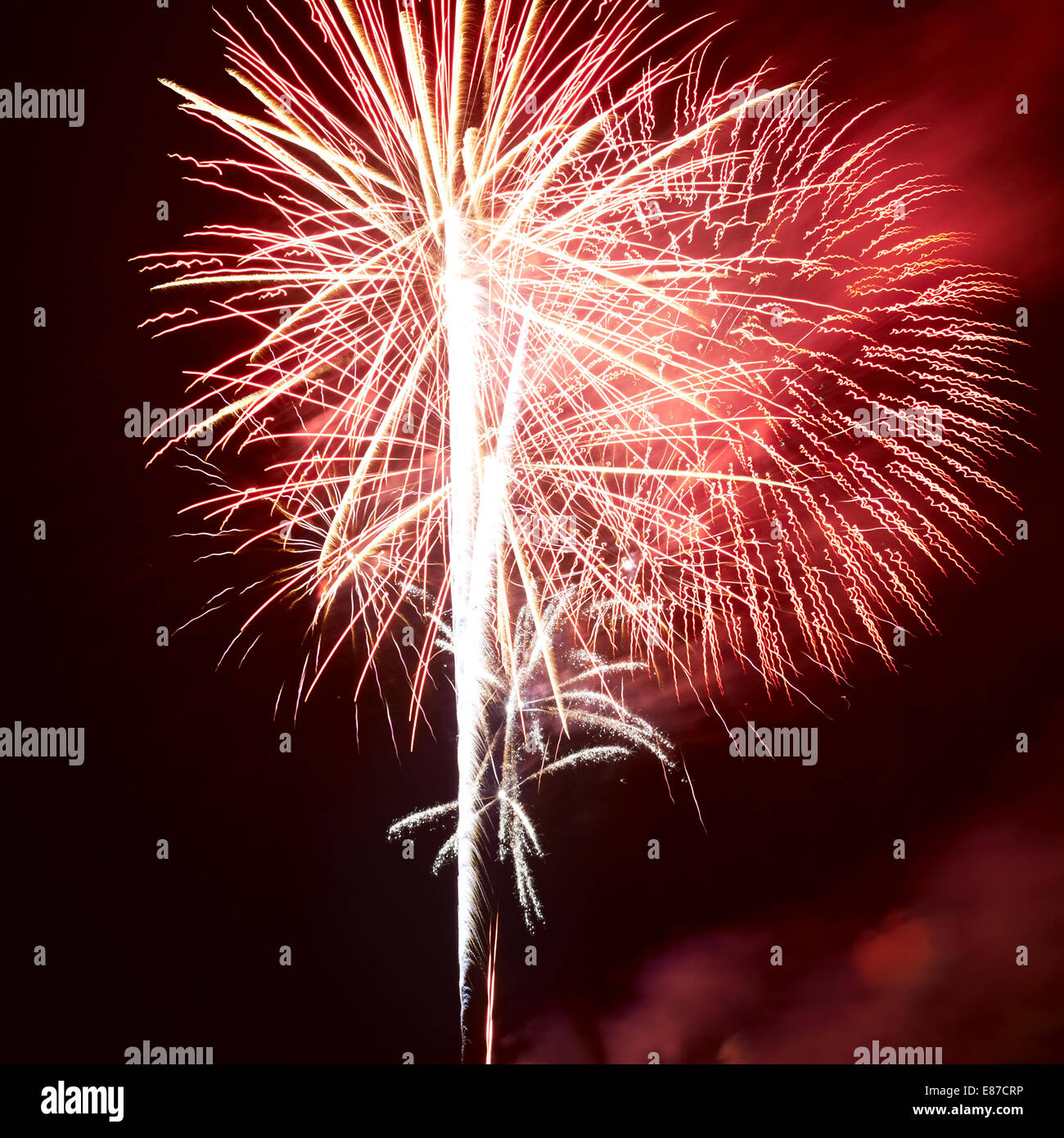 Red colorful fireworks on the black sky background Stock Photo - Alamy