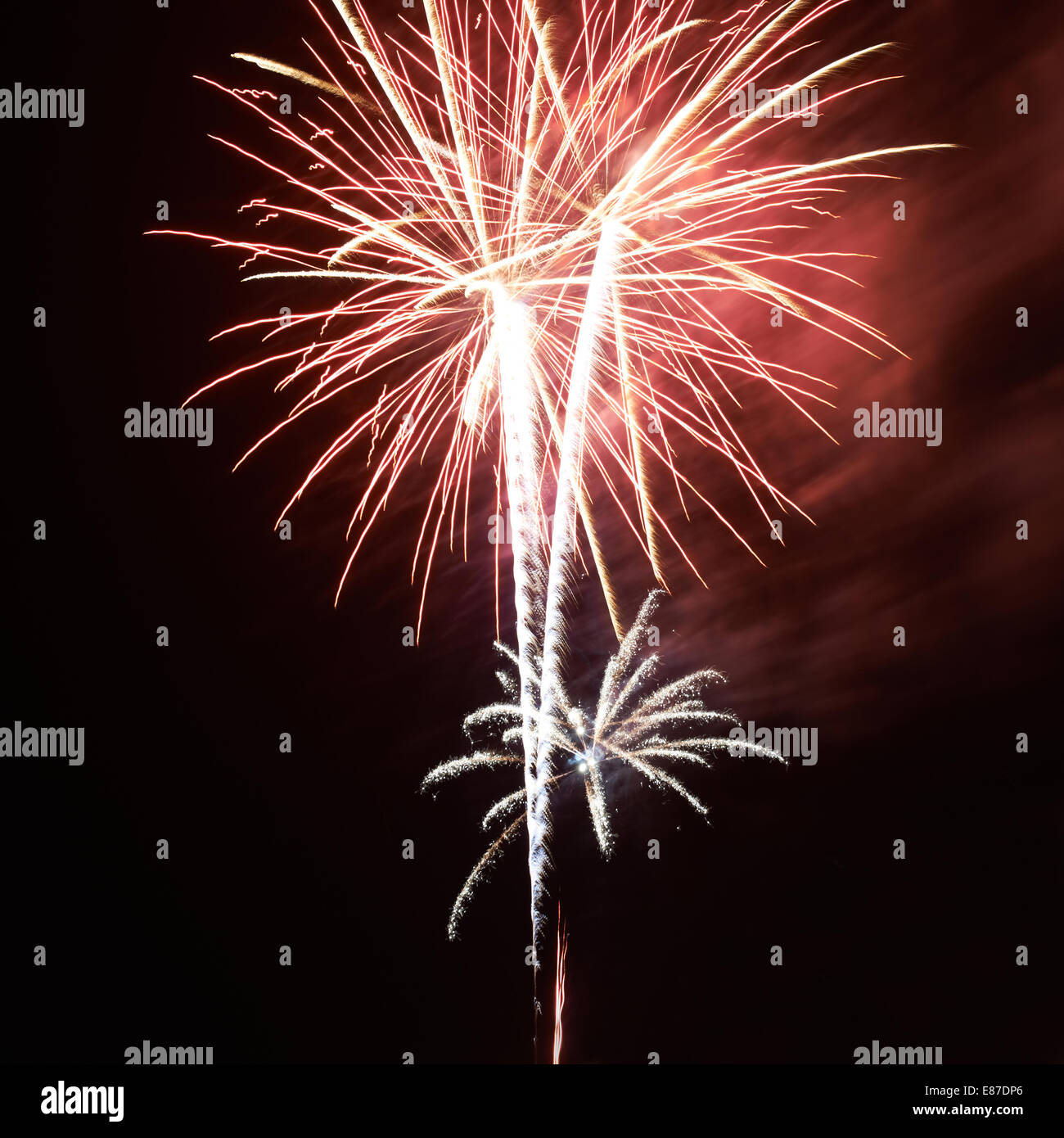 Red colorful fireworks on the black sky background Stock Photo - Alamy