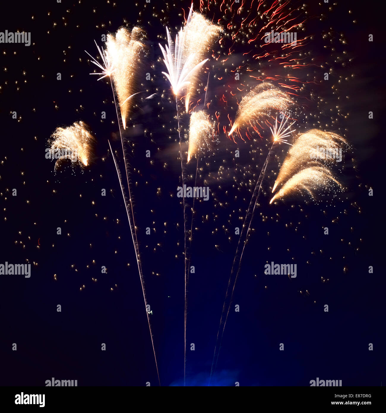 Red colorful fireworks on the black sky background Stock Photo - Alamy