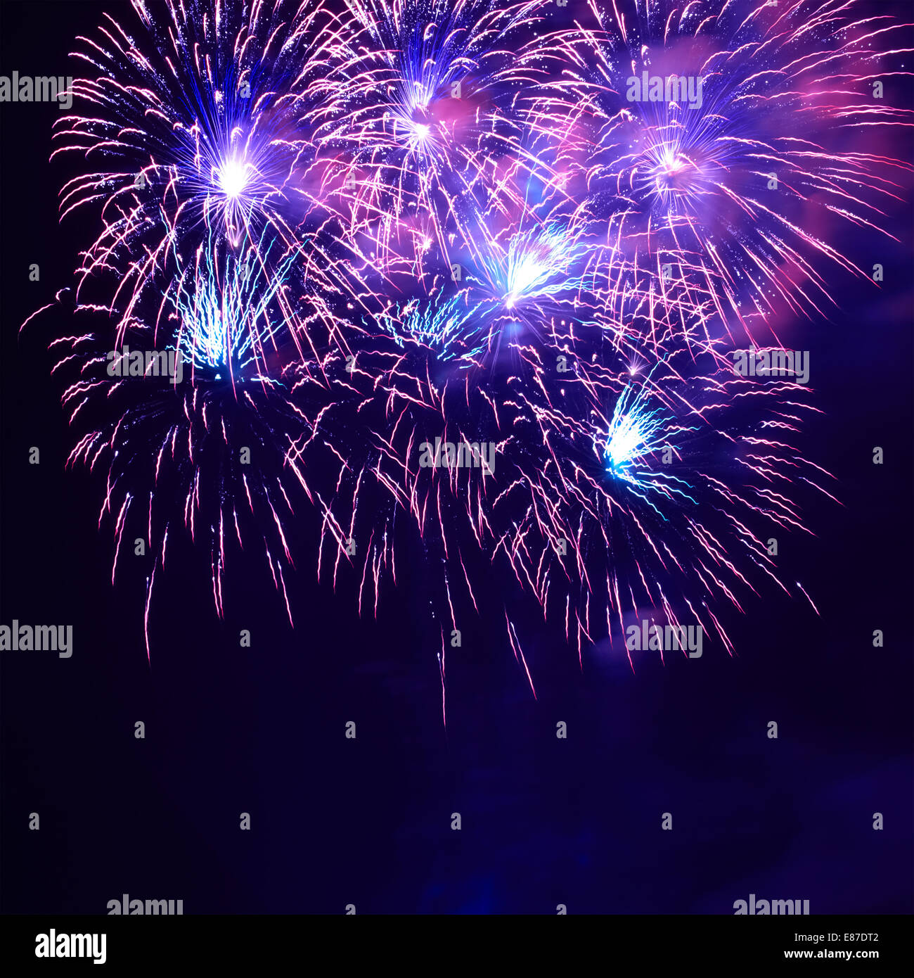 Blue colorful fireworks on the black sky background Stock Photo - Alamy