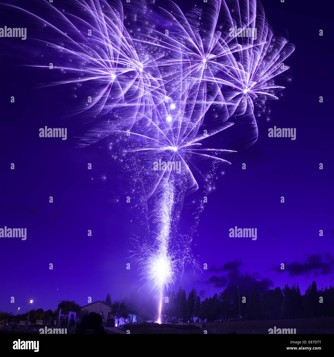 Blue colorful fireworks on night sky background Stock Photo - Alamy