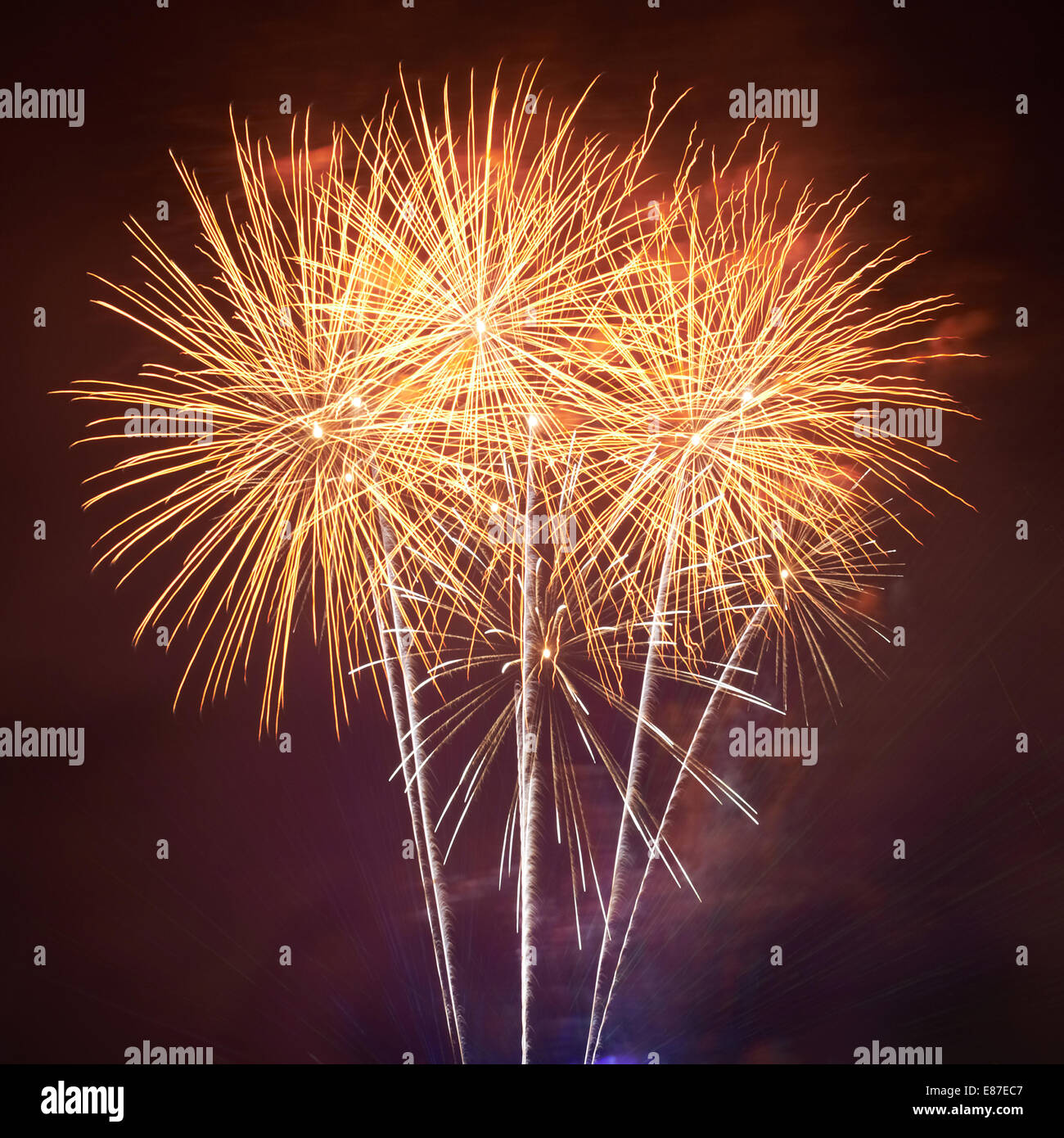 Red colorful fireworks on the black sky background Stock Photo - Alamy