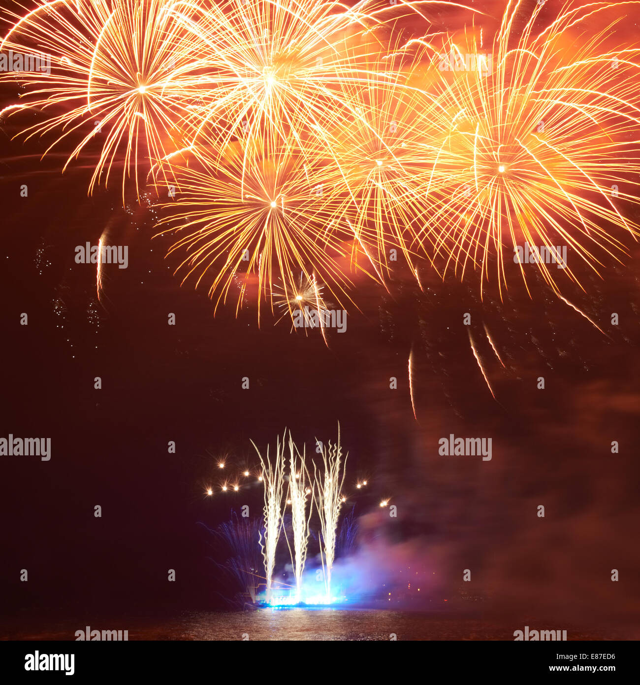Red colorful fireworks on the black sky background Stock Photo - Alamy