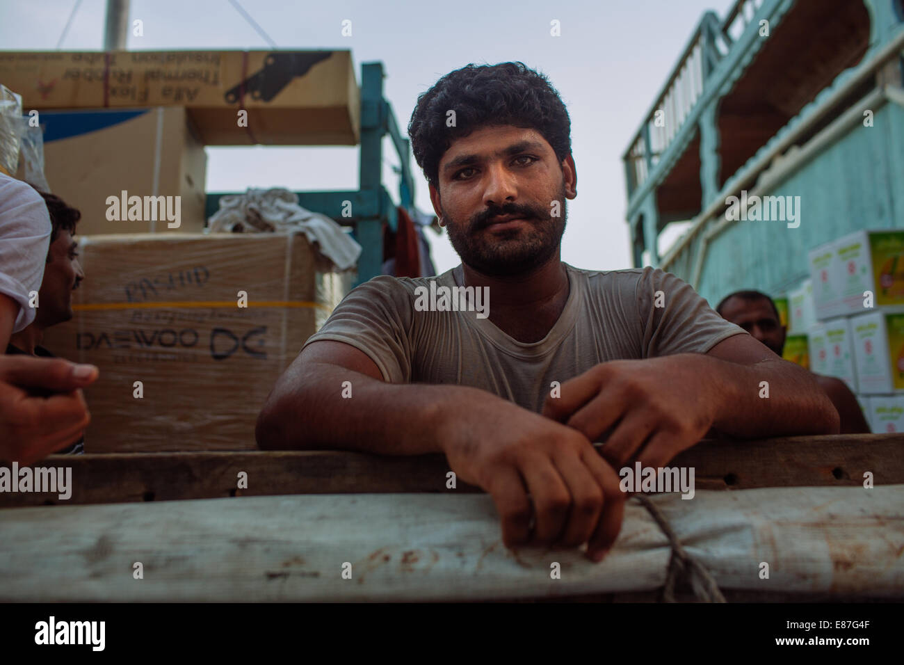 Port workers at Deira Port in Dubai Creek, UAE Stock Photo - Alamy